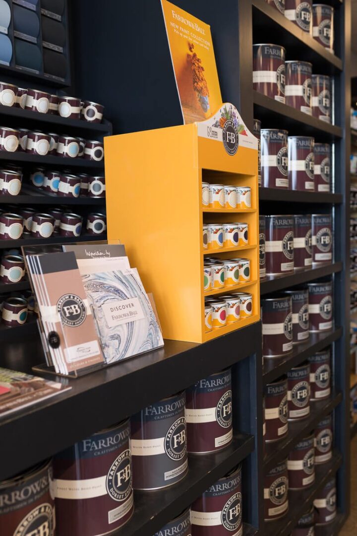 Paint store shelves with color samples displayed. ⋆ Jewel Marlowe